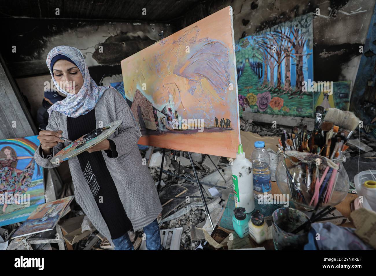 Meysa Youssef, a 40-year-old Palestinian collage artist who lost both ...