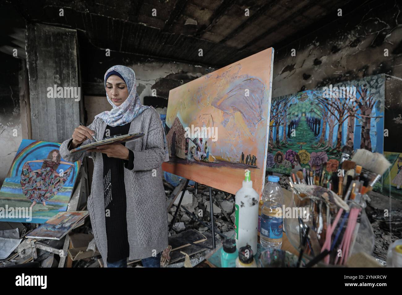 Meysa Youssef, a 40-year-old Palestinian collage artist who lost both ...