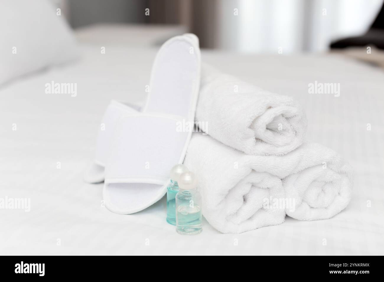 Clean towels on bed at hotel room Stock Photo - Alamy