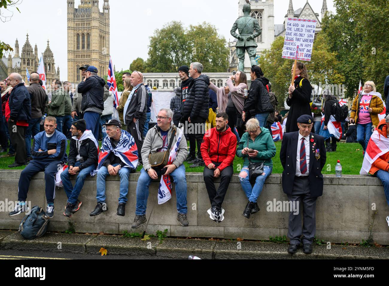 A woman holding a pro-Christian placard at the 'Uniting the Kingdom ...
