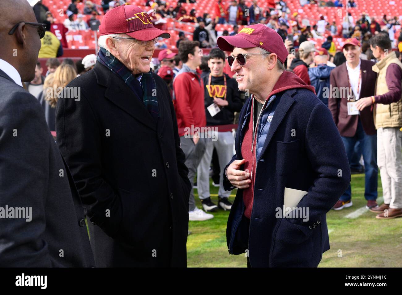 Washington Commanders managing partner Josh Harris, right, and former ...