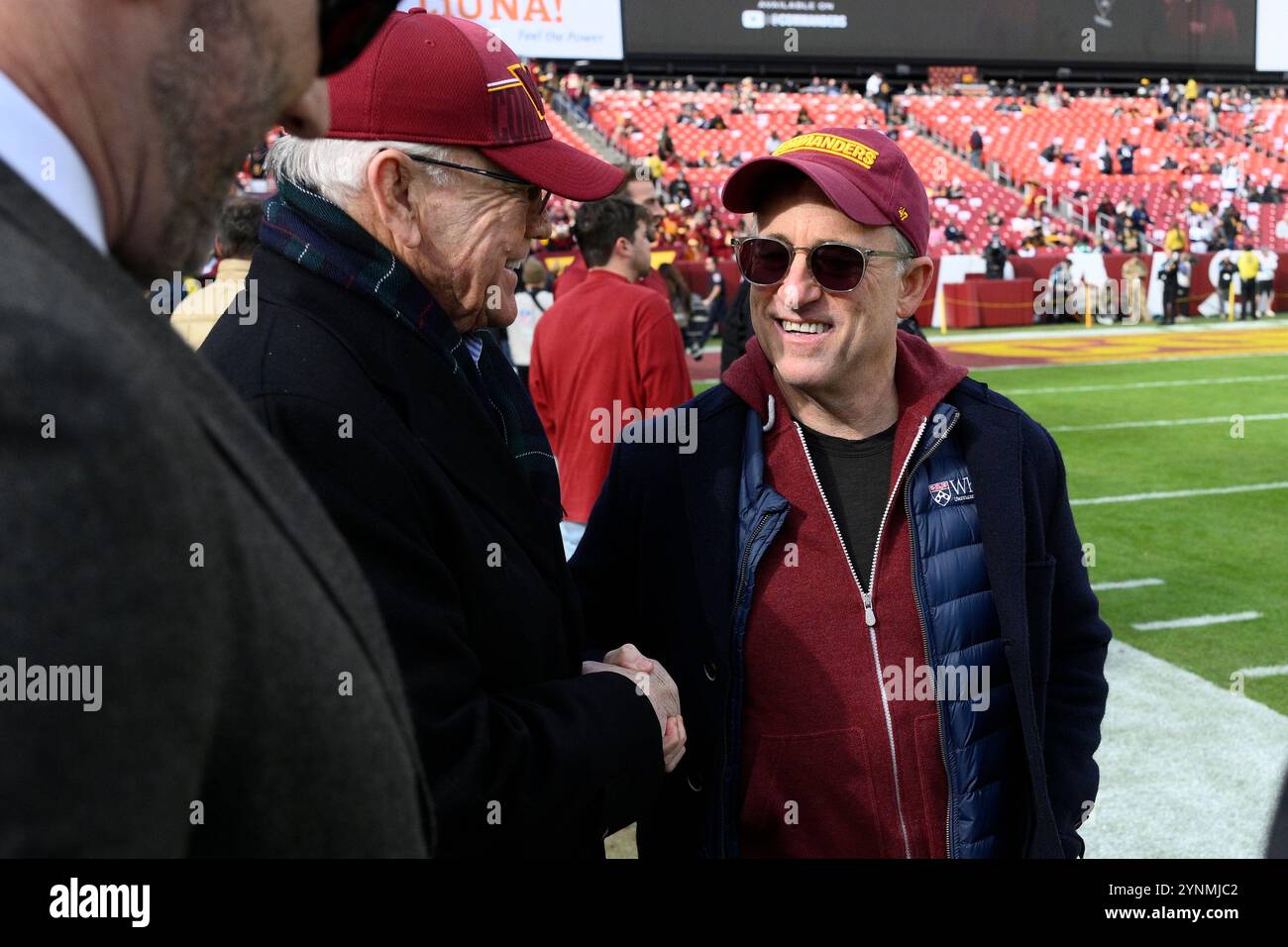 Washington Commanders managing partner Josh Harris, right, and former ...