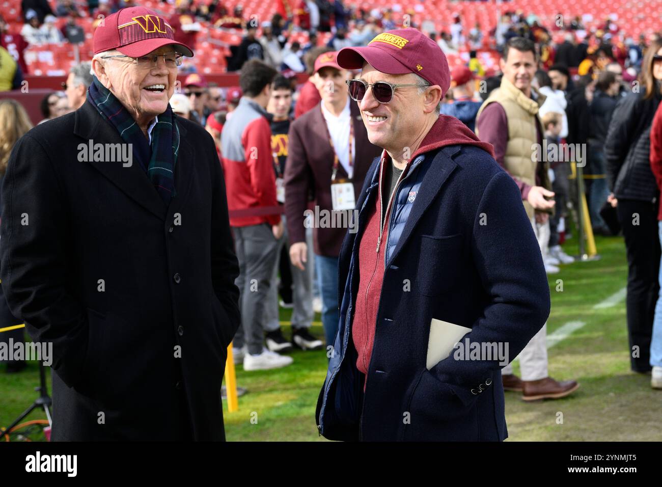 Washington Commanders managing partner Josh Harris, right, and former ...