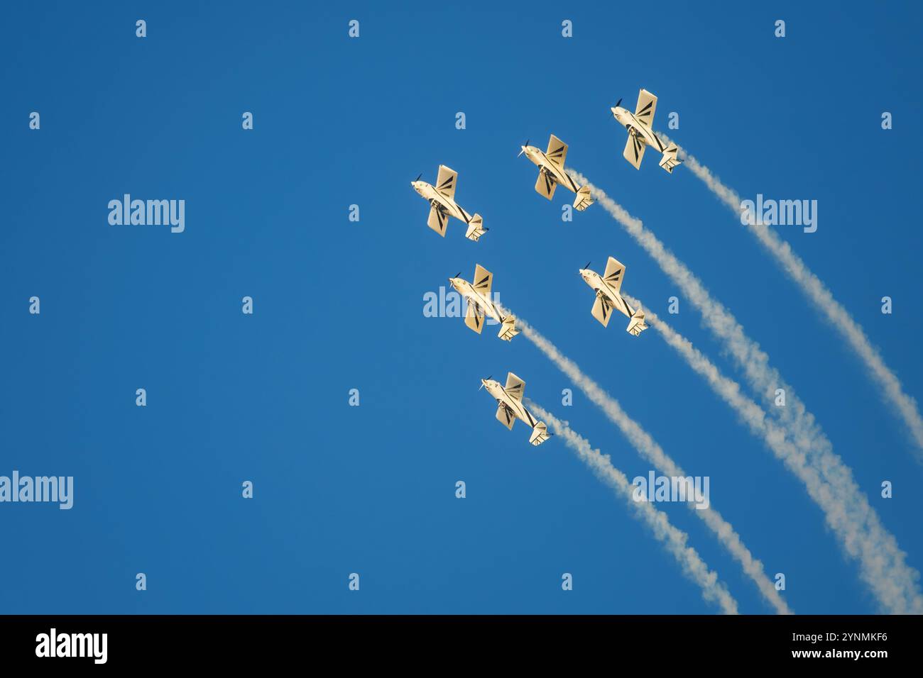 Stunt aerobatic planes performing stunts in air Stock Photo - Alamy