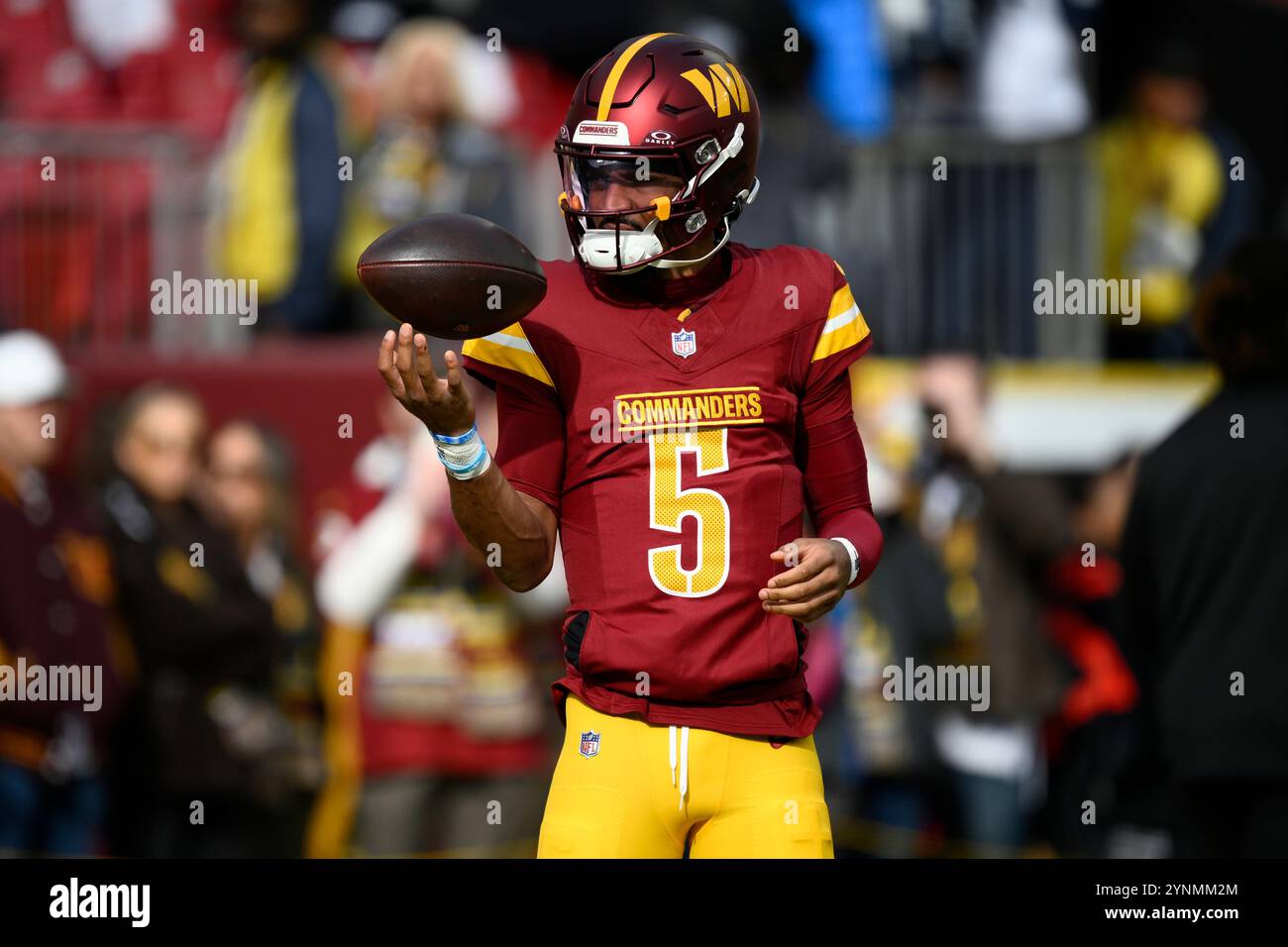 Washington Commanders quarterback Jayden Daniels (5) works out before ...
