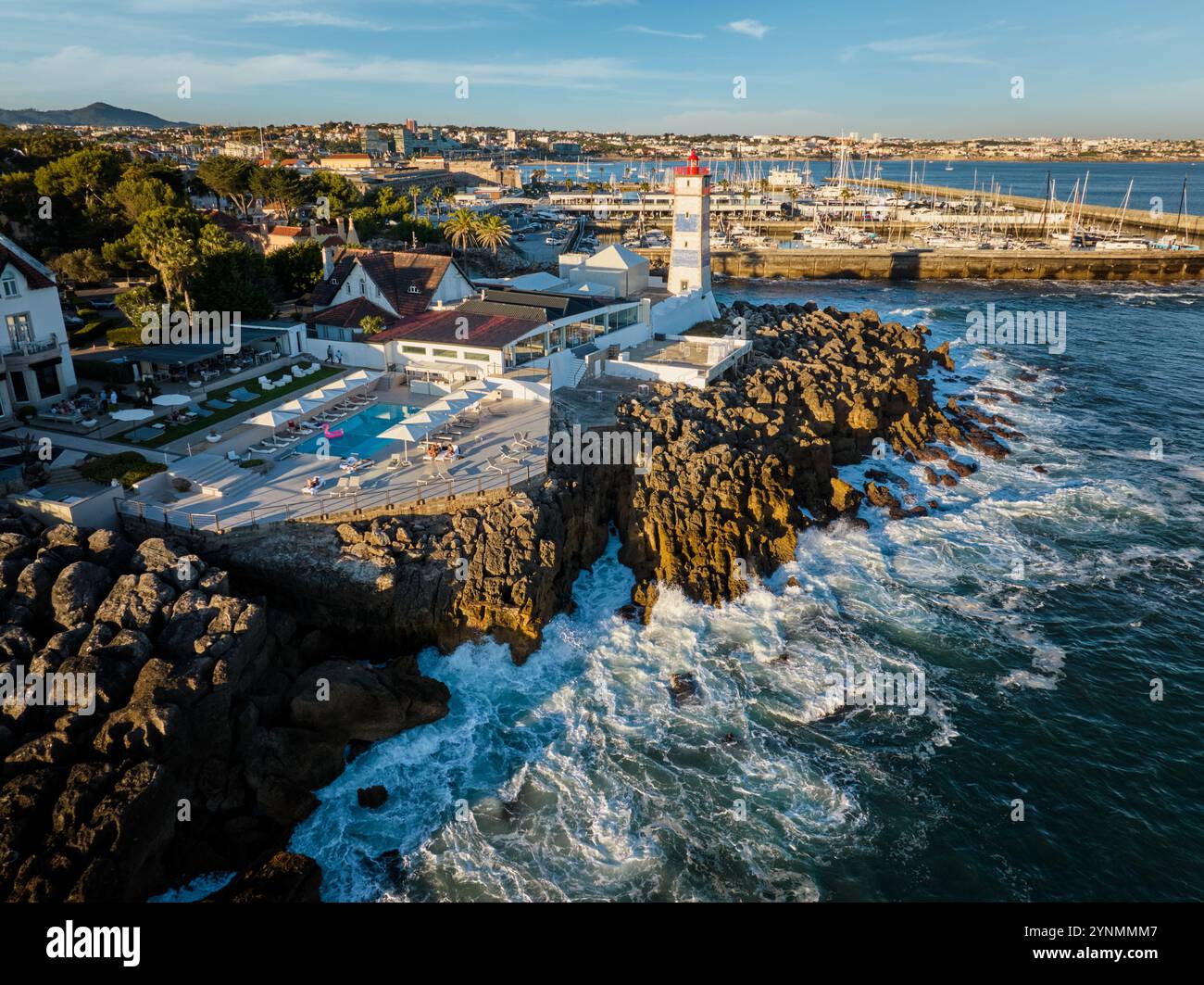 Aerial view of Santa Marta lighthouse and Cascais marina with Cascais ...