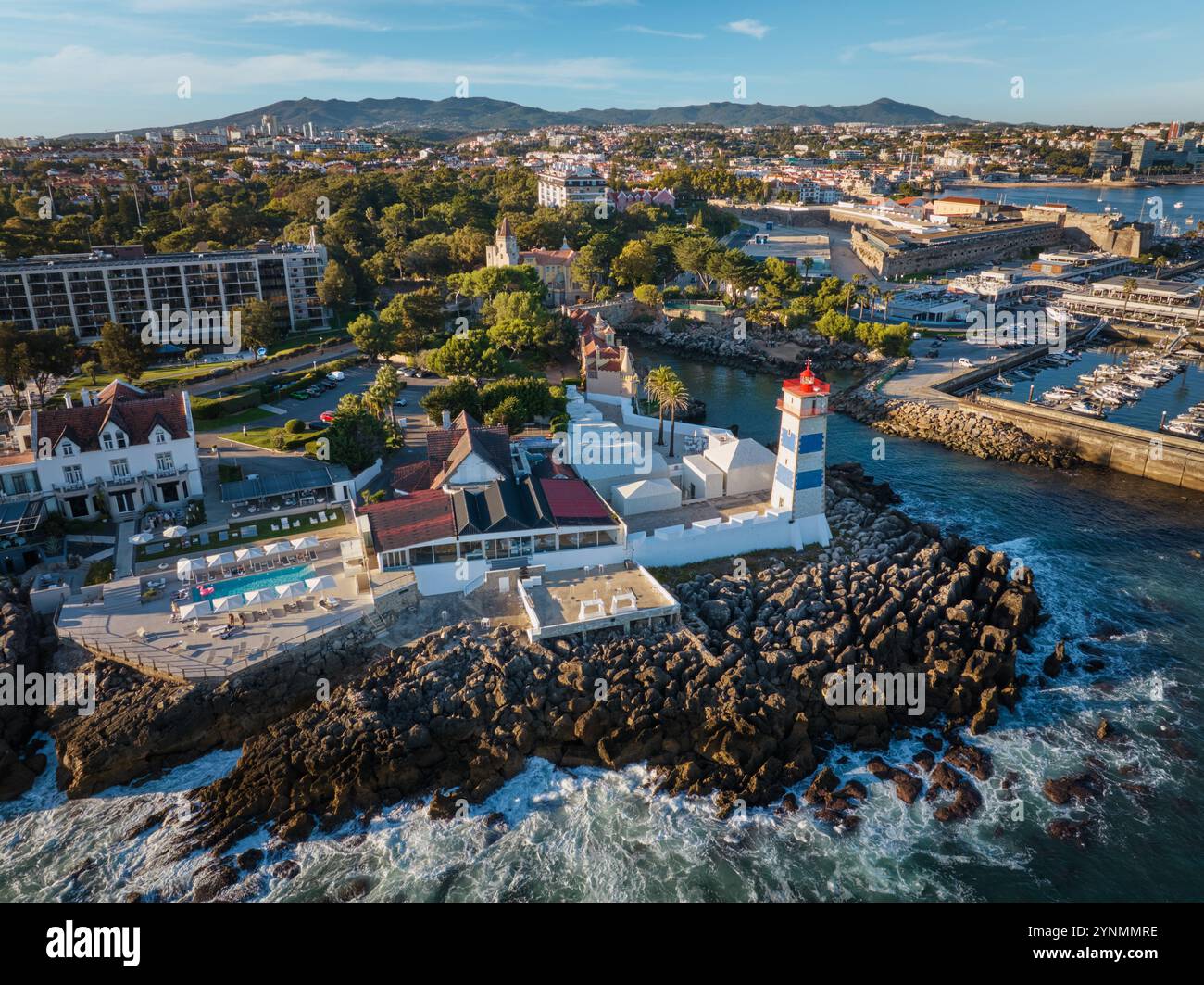 Aerial view of Santa Marta lighthouse and Cascais marina with Cascais ...