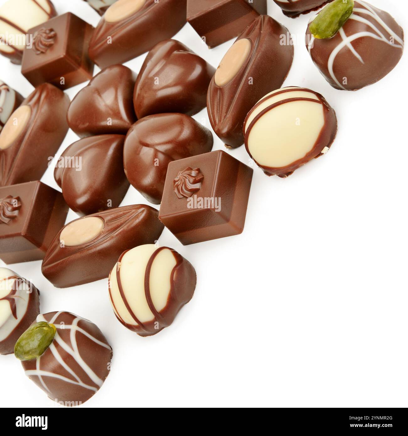 Various chocolate pralines isolated on white background. Top view ...