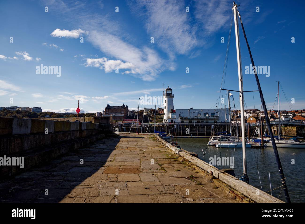 The walkway along East Harbour Pier, Scarborough, England Stock Photo ...