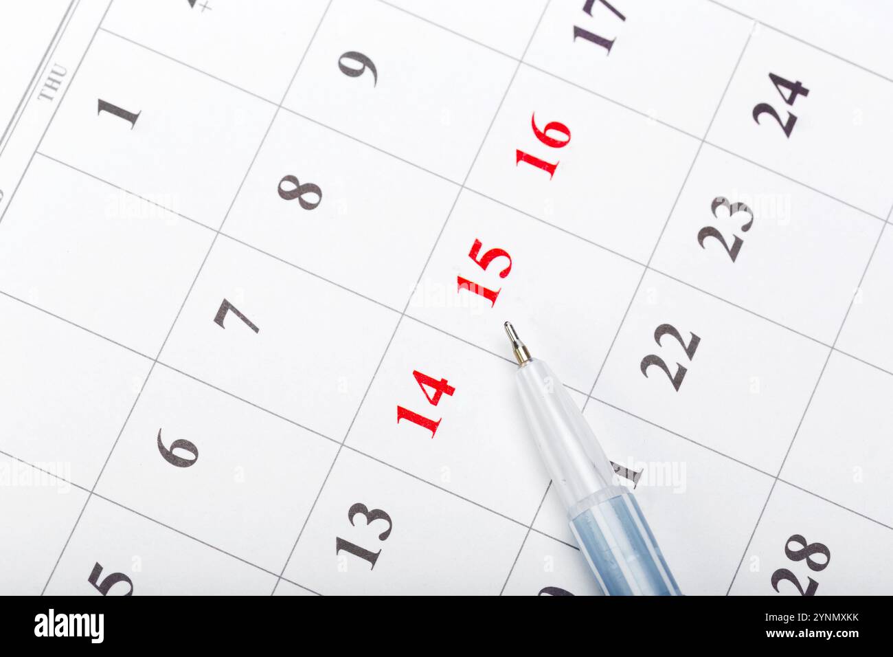 Check out the dates in a business calendar concept Stock Photo - Alamy