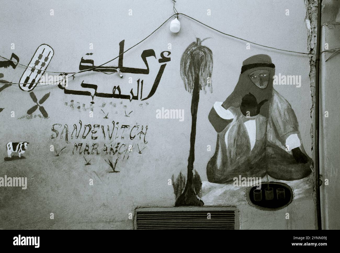 Surreal street graffiti art In the medina souk of the old city of ...