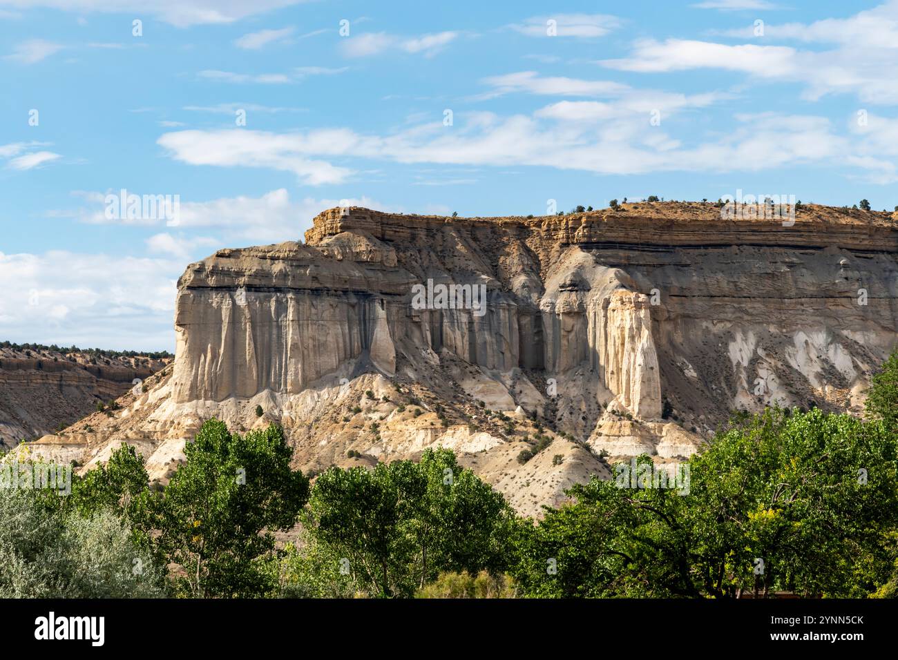 Hoodoos and rocky buttes rise from the arid southwest landscape of the ...