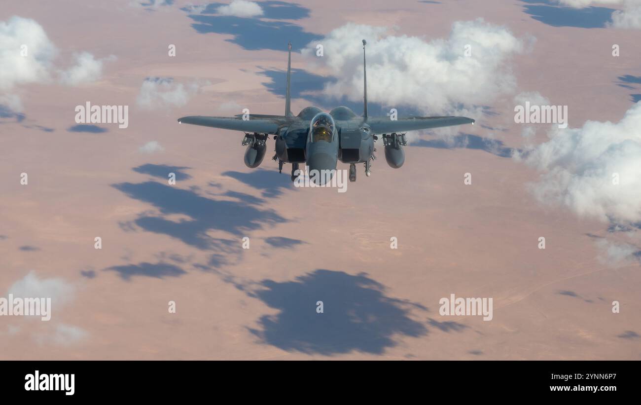A U.S. Air Force F-15E Strike Eagle performs combat patrols over the U ...
