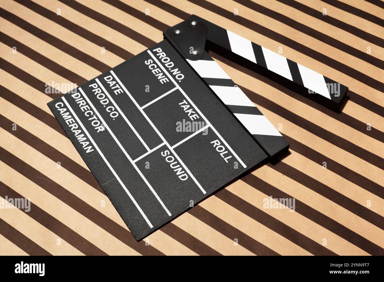 Film clapper board on a table Stock Photo - Alamy
