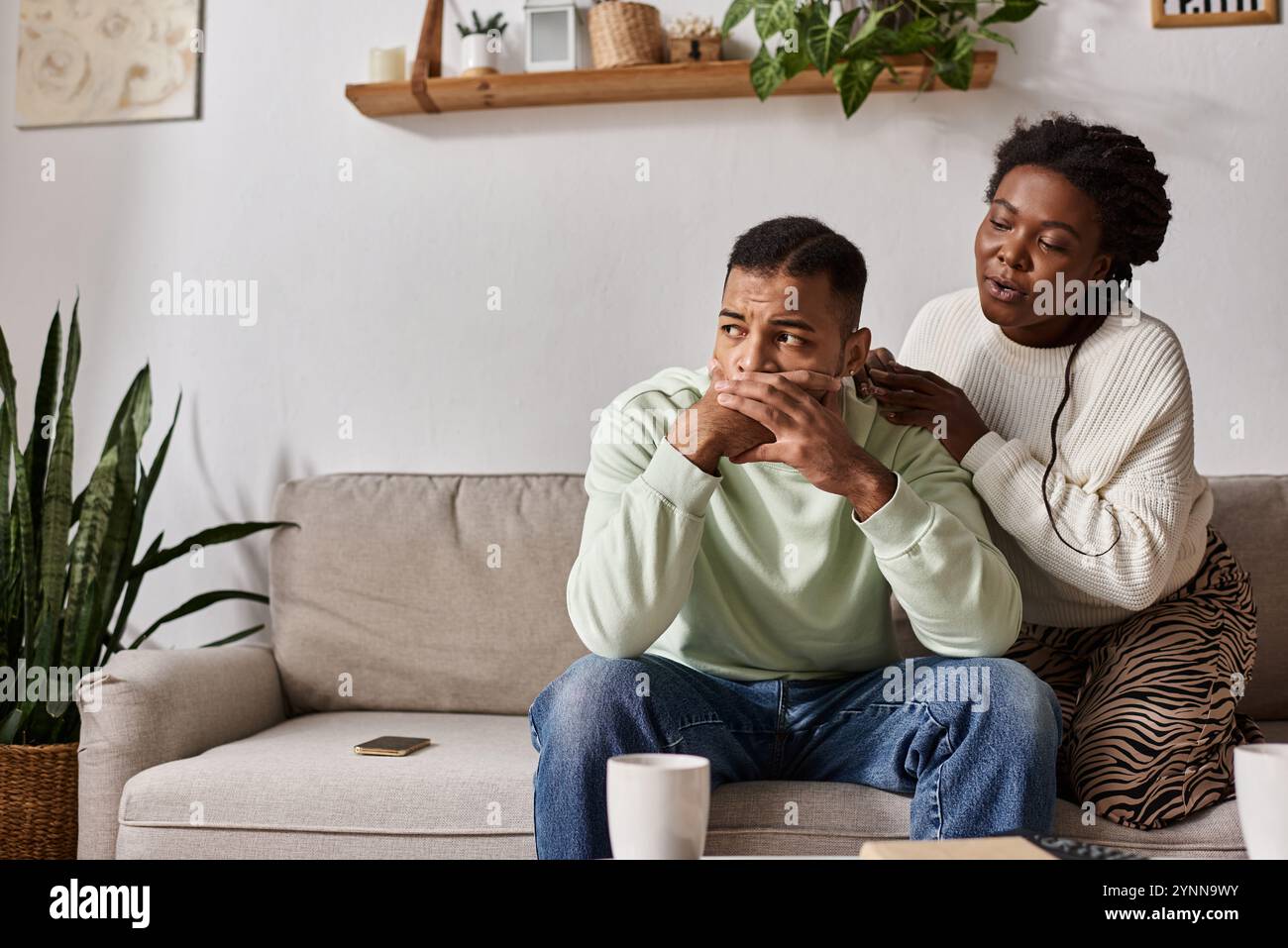 African American couple wearing sweaters during winter, woman ...