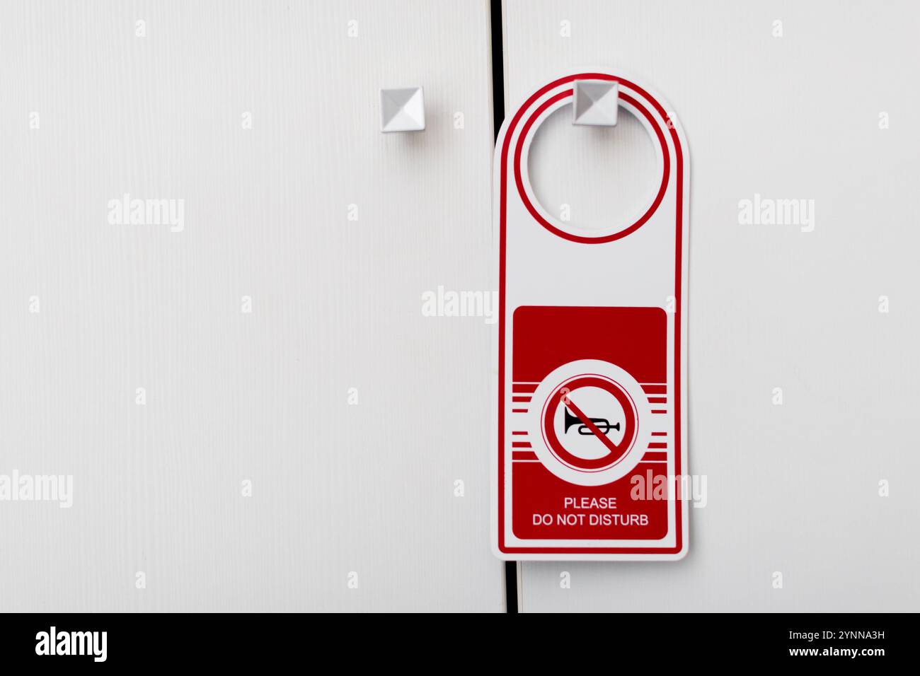 Hotel room sign do not disturb Stock Photo - Alamy