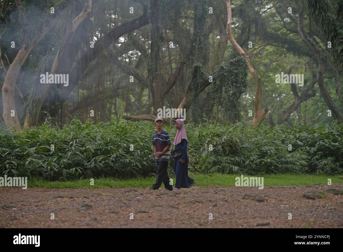 Banyuwangi, East Java, Indonesia. 24th Nov, 2024. Tourists enjoy the ...