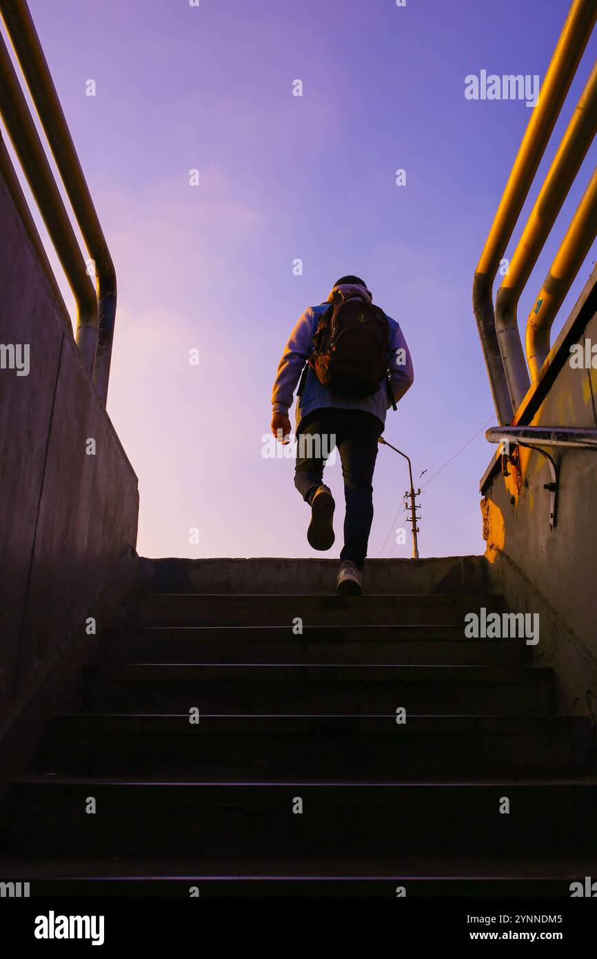 Figure going up stairs hi-res stock photography and images - Alamy