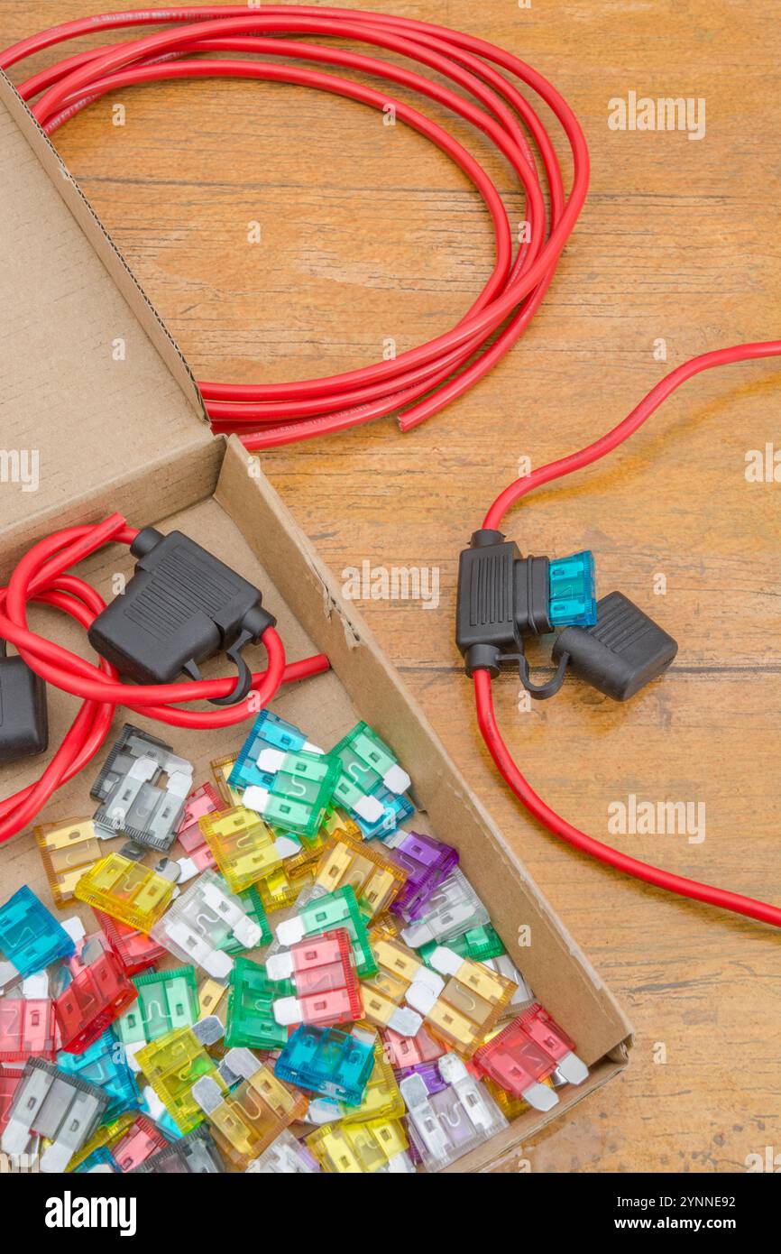 Colourful assortment of automotive blade fuses and waterproof fuse ...