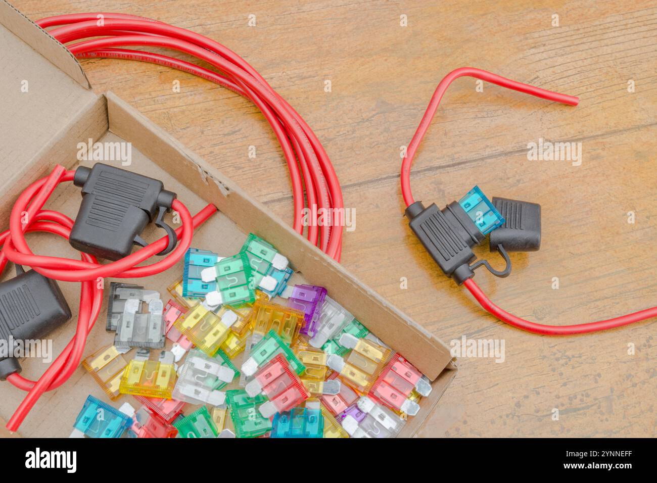 Colourful assortment of automotive blade fuses and waterproof fuse ...