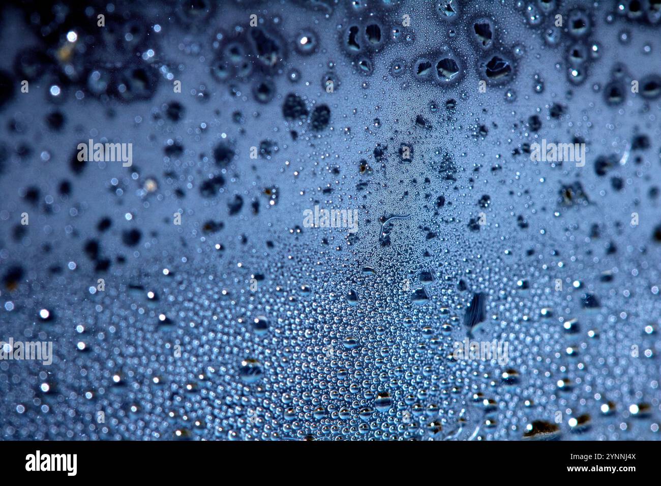 CLose Up of Condensation Bubbles and Marks on A Window Water Background ...
