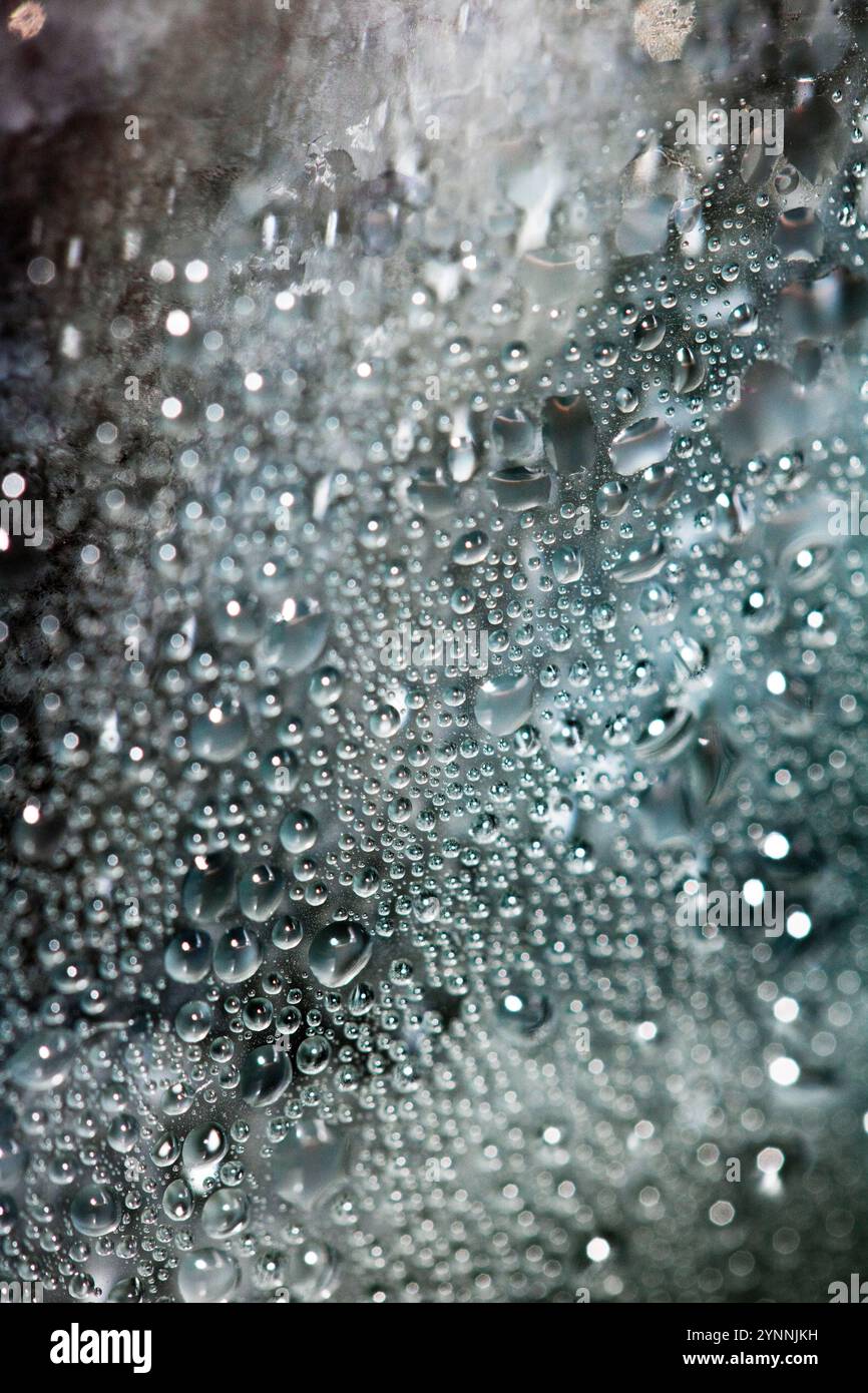 CLose Up of Condensation Bubbles and Marks on A Window Water Background ...