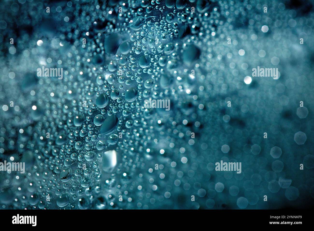 CLose Up of Condensation Bubbles and Marks on A Window Water Background ...