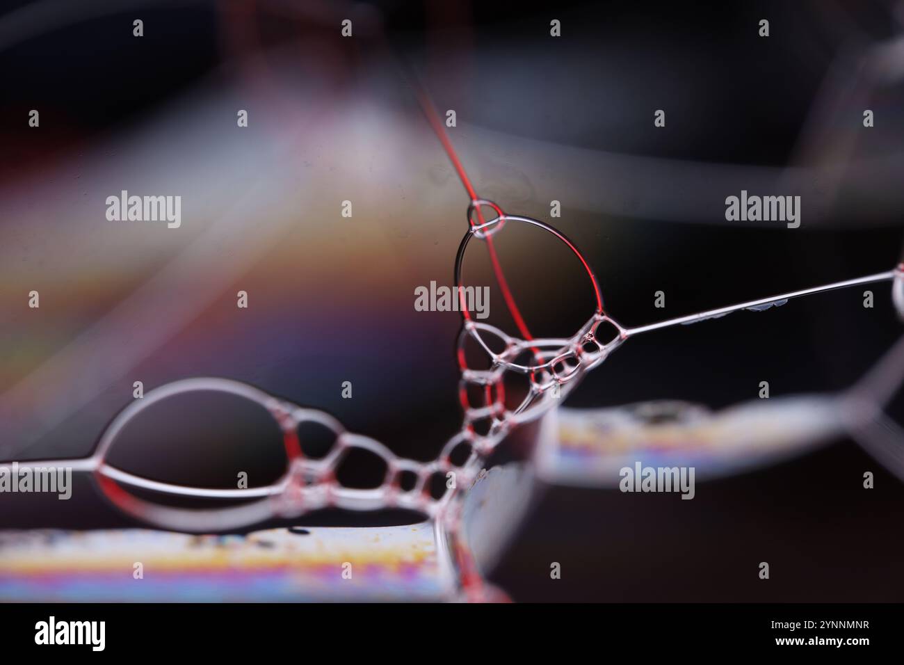 Silver liquid connections, bubble in macro, movement of liquid in a ...