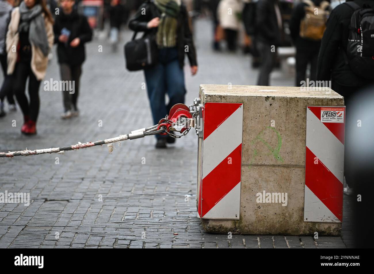 26 November 2024, Saxony-Anhalt, Halle (Saale): A roadblock made of ...