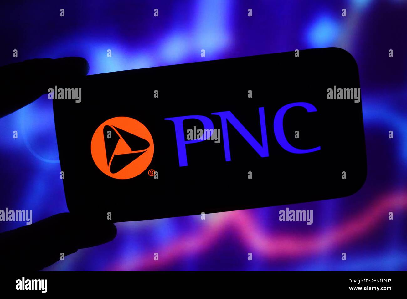 In this photo illustration, the PNC Financial Services company logo is ...