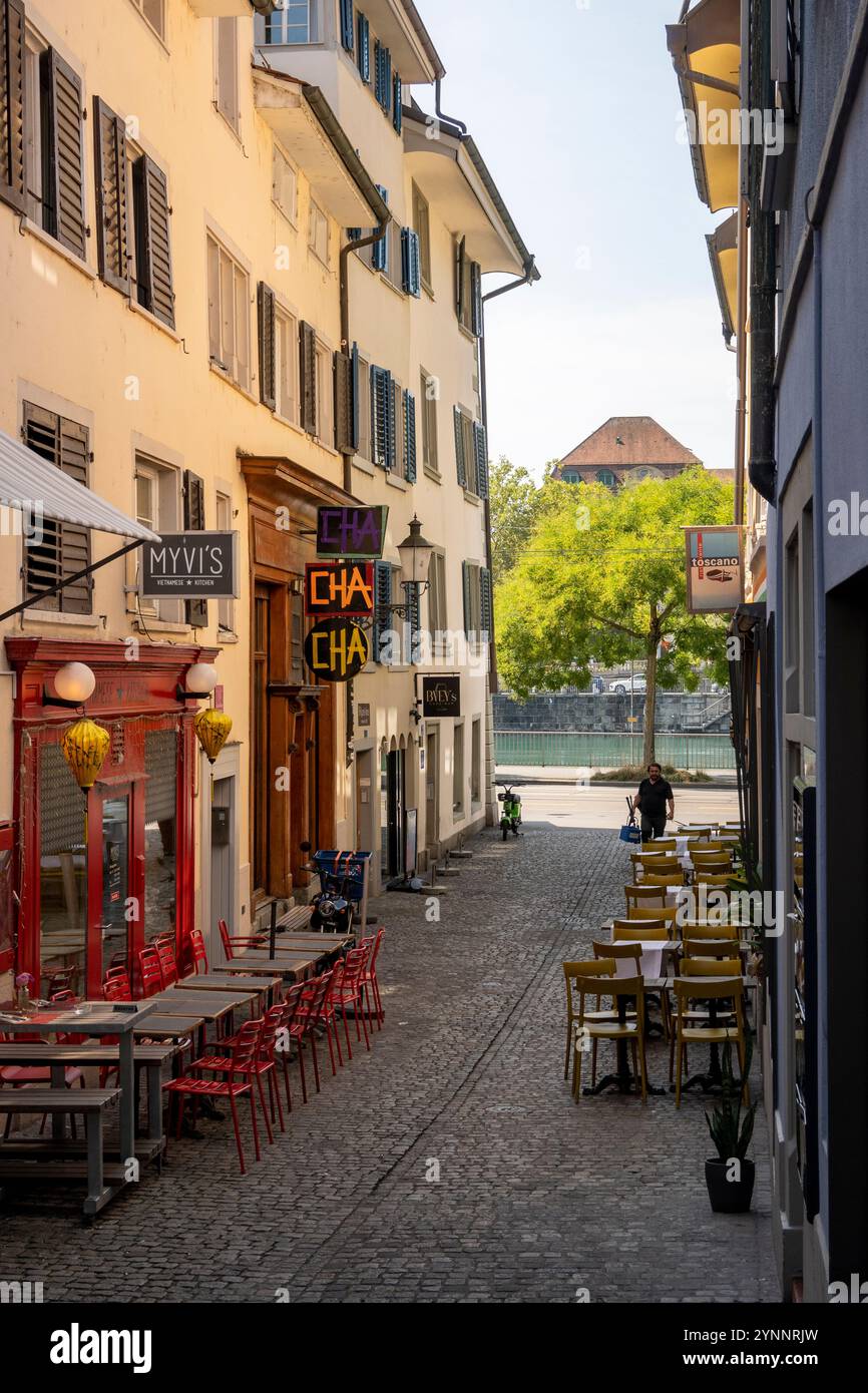 cafe in a narrow street in Zurich Stock Photo - Alamy