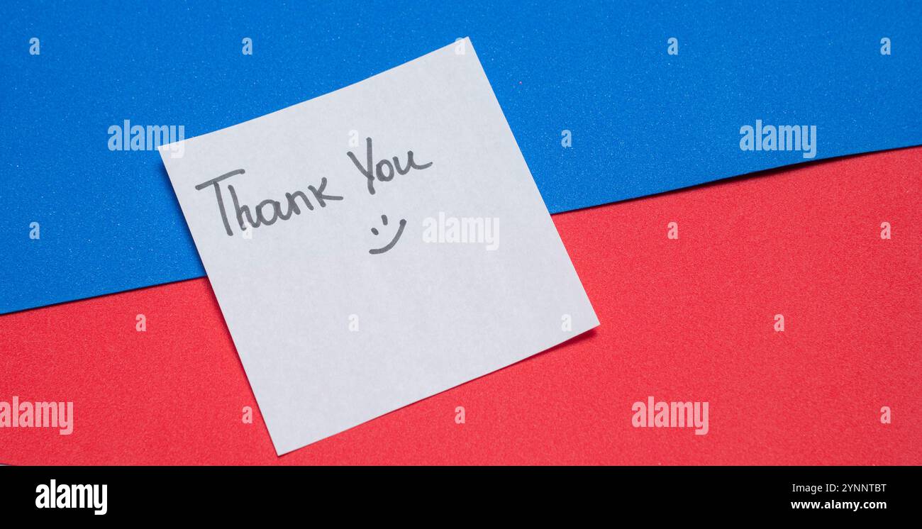 Words thank you written on sticky note Stock Photo - Alamy