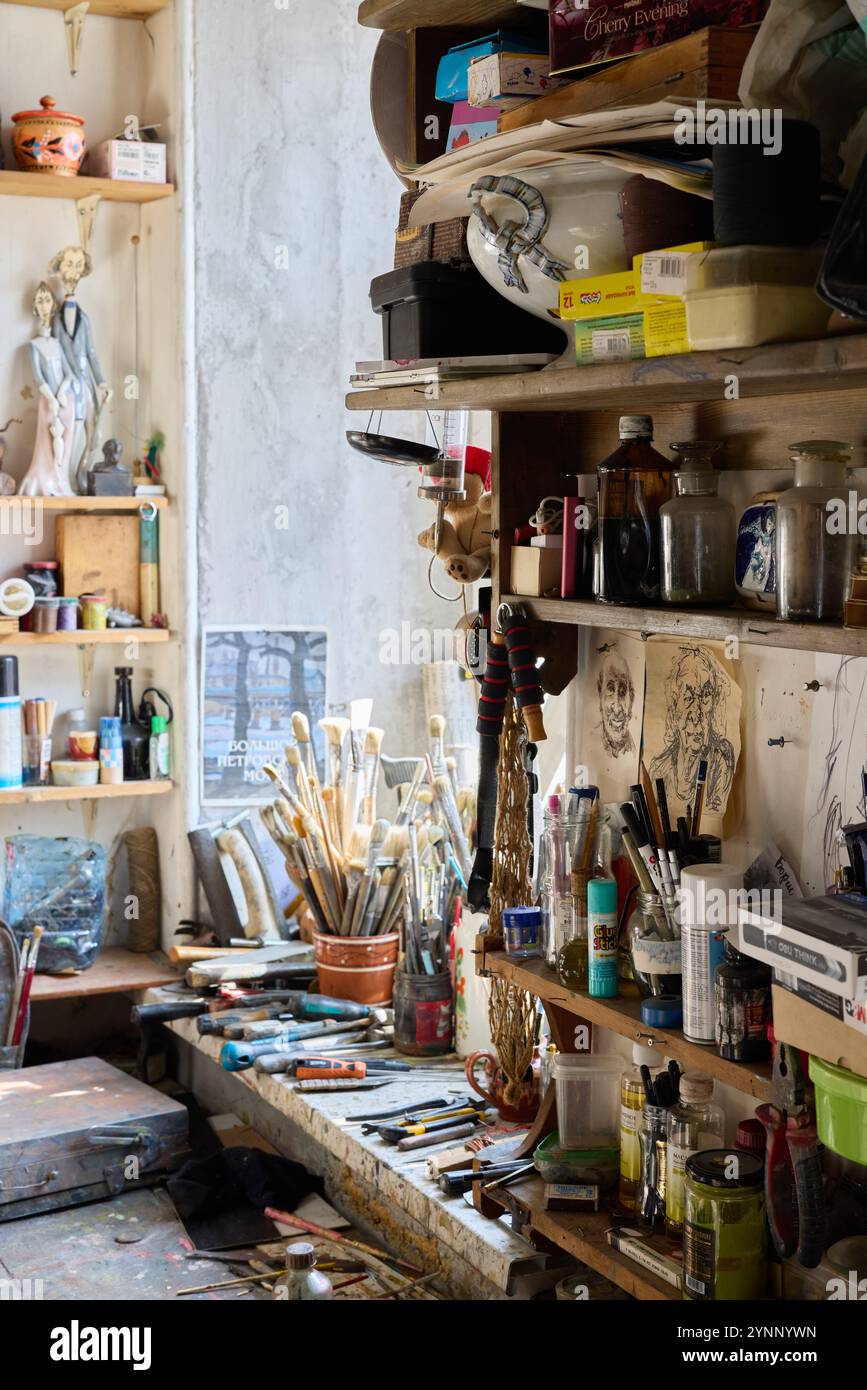 A Creative Workspace Featuring Art Supplies Alongside Endless ...