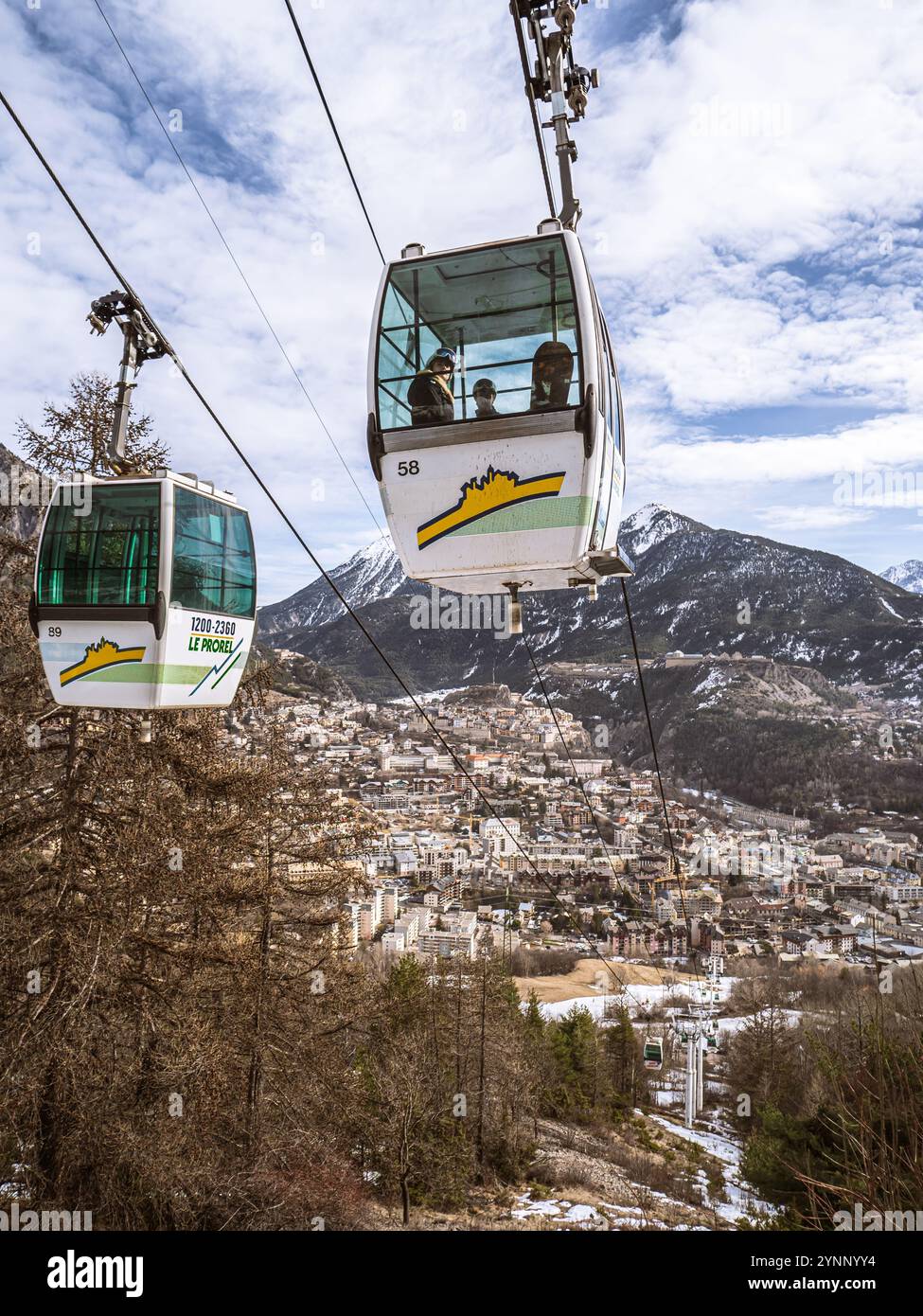 Cable cars glide above Briançon, offering stunning views of the ...