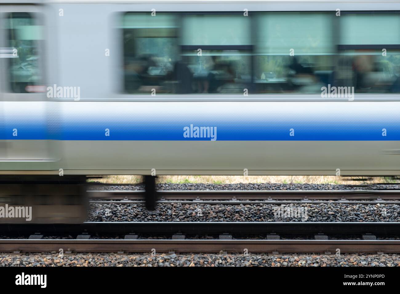 Train in motion departing station hi-res stock photography and images ...