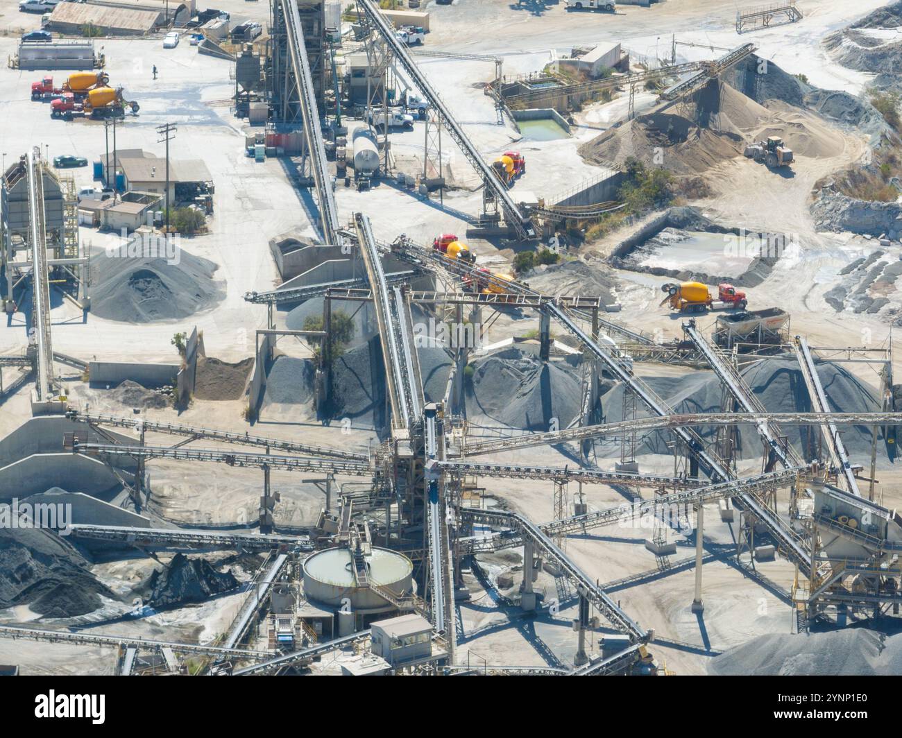 Aerial view of industrial sand and gravel quarry open-pit mining site ...