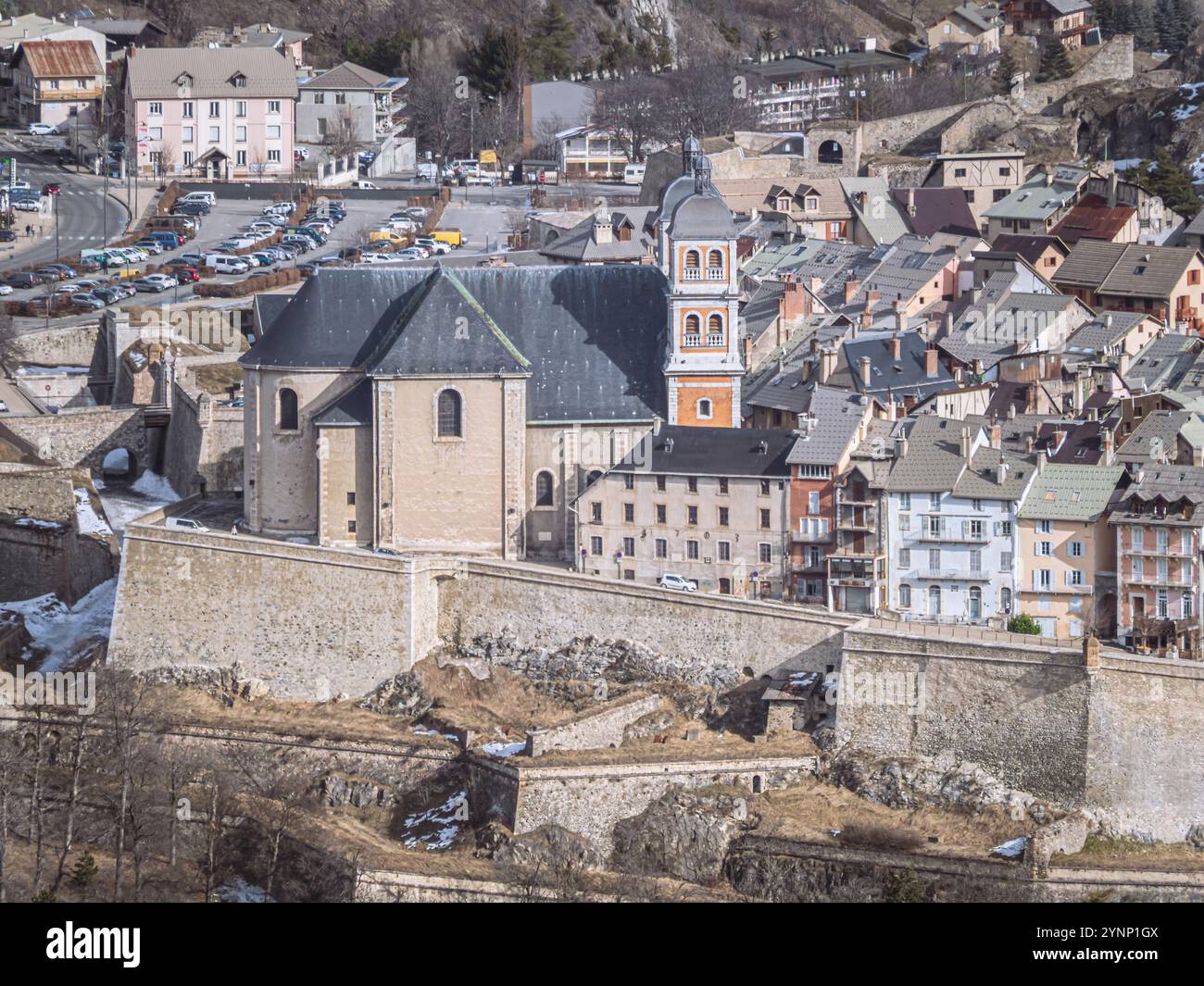 An aerial view of Briançon, France, showcasing a historic church, its ...