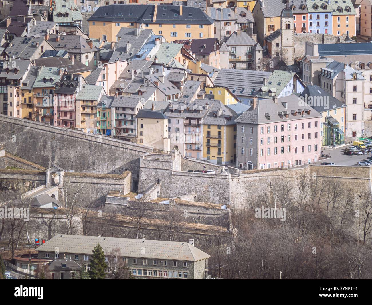 An aerial view of Briançon, France, highlighting its vibrant houses ...