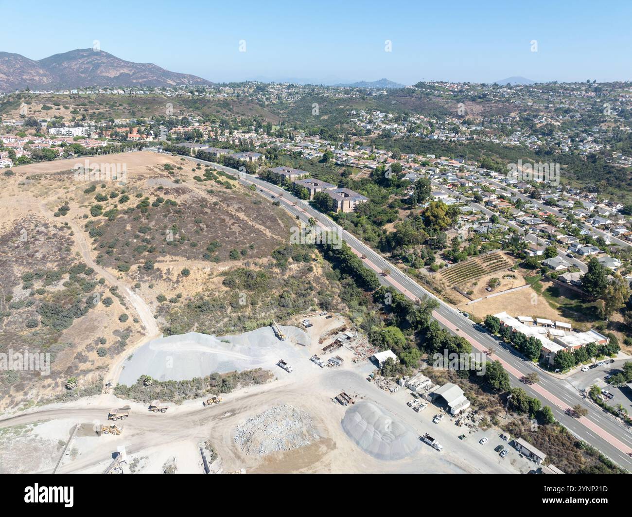 Aerial view of industrial sand and gravel quarry open-pit mining site ...