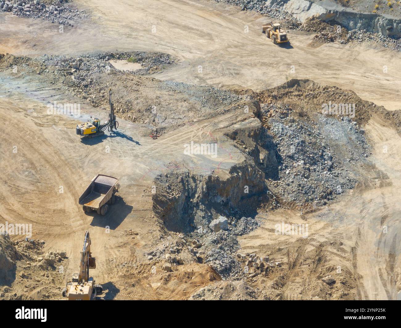 Aerial view of industrial sand and gravel quarry open-pit mining site ...