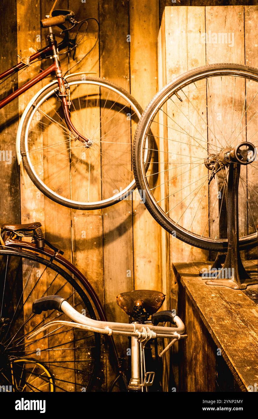 Vintage bike repair workshop at a living history museum Stock Photo - Alamy