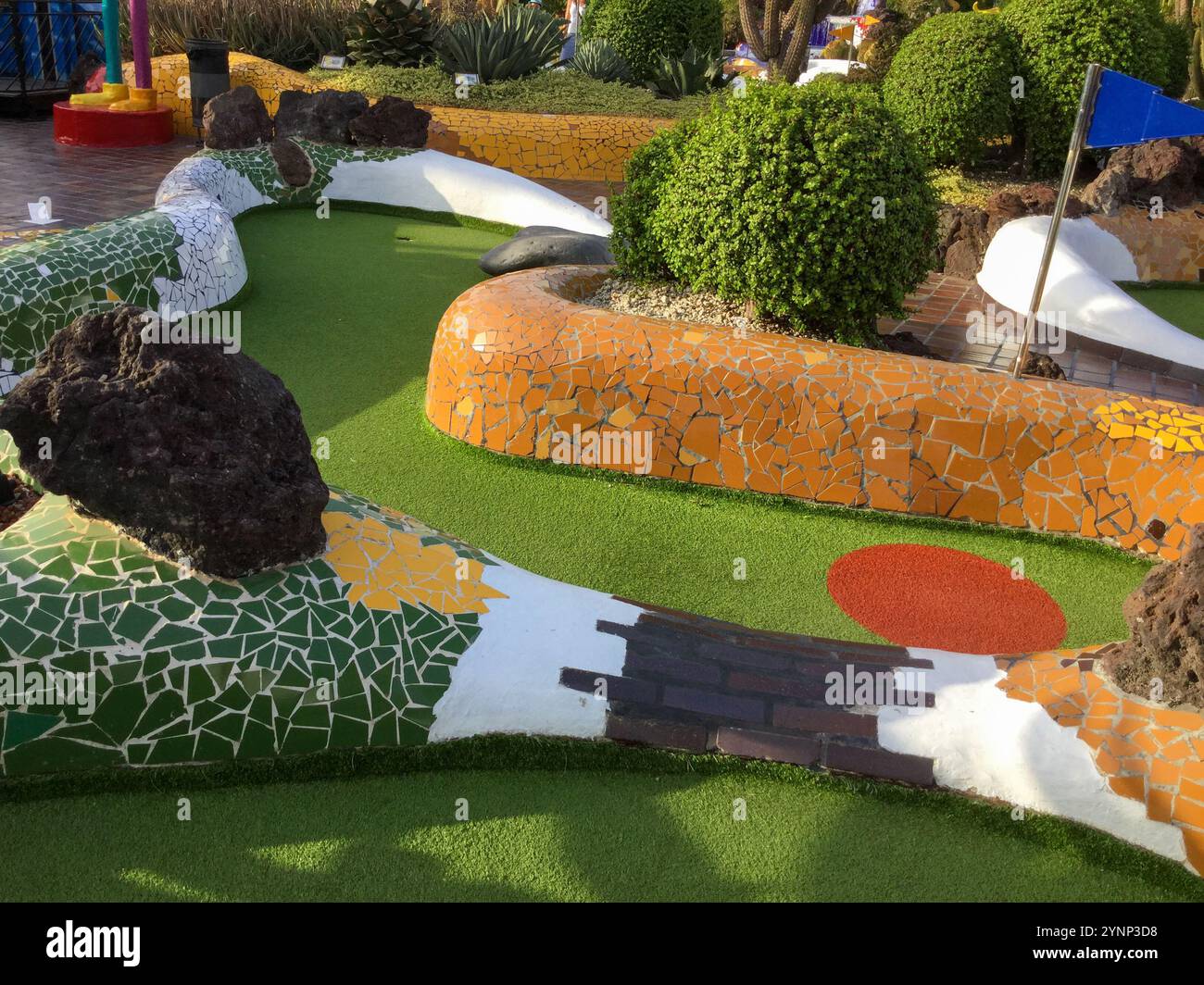The mini golf course features creatively designed greens, colorful ...