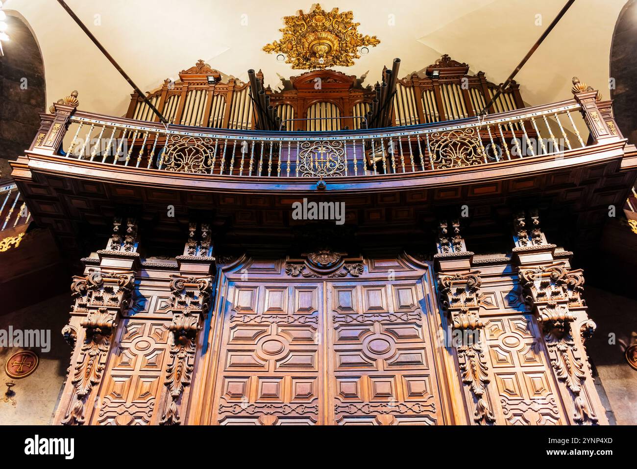 Monumental wooden door at the entrance, under the pipe organ. Basilica ...