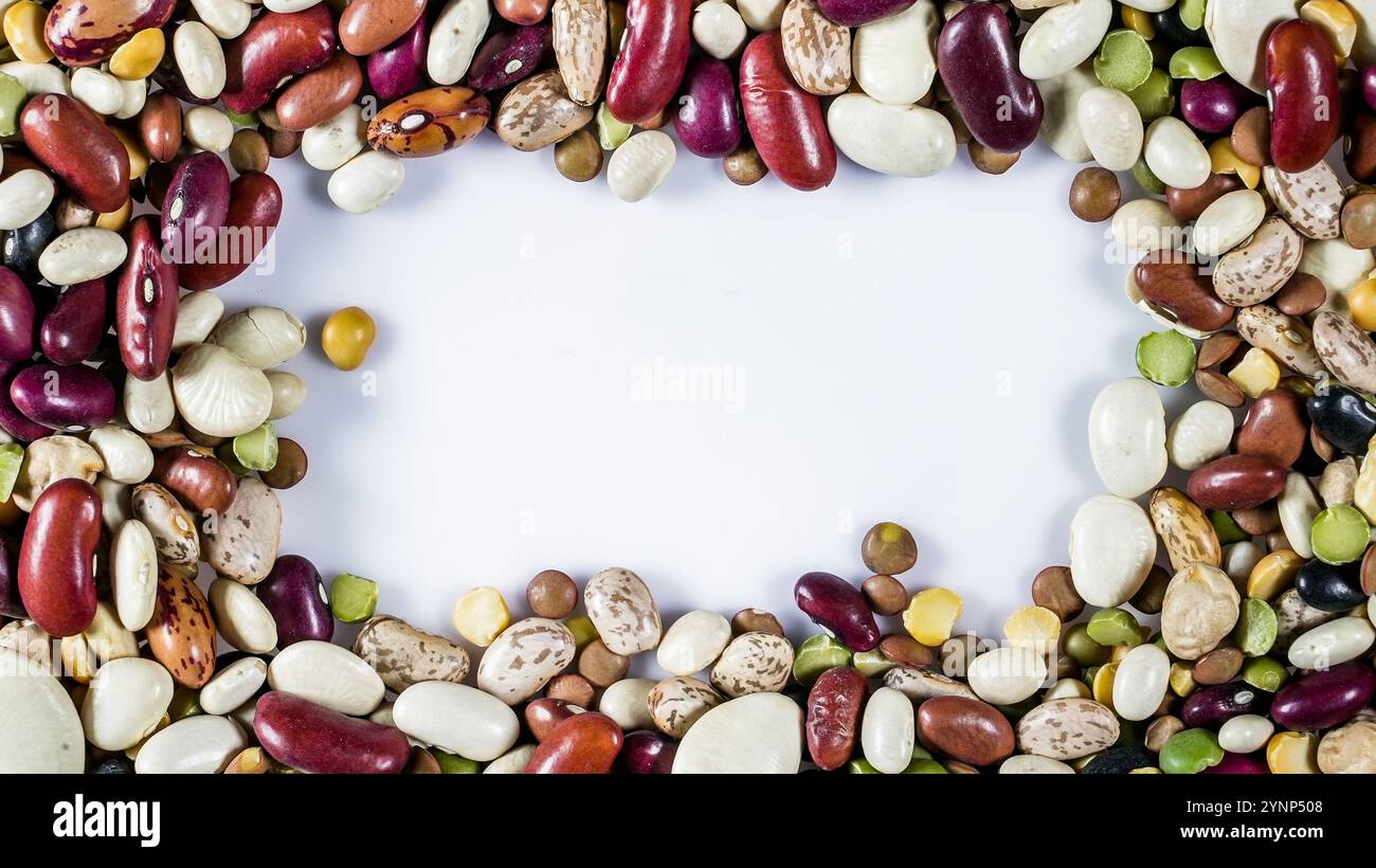 Various types of dried beans create a vibrant border surrounding a ...