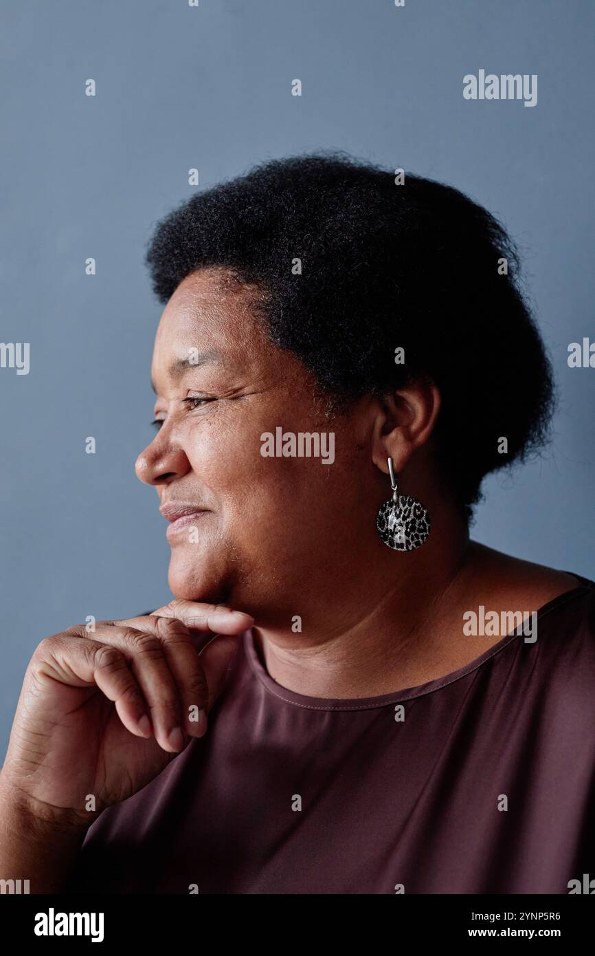 African woman side light face hi-res stock photography and images - Alamy