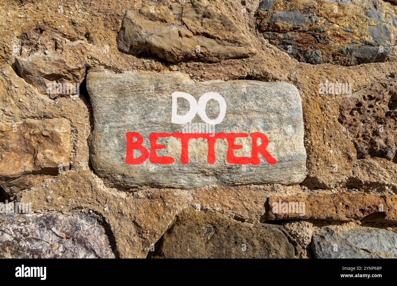 Do better symbol. Concept words Do better on beautiful grey stone ...