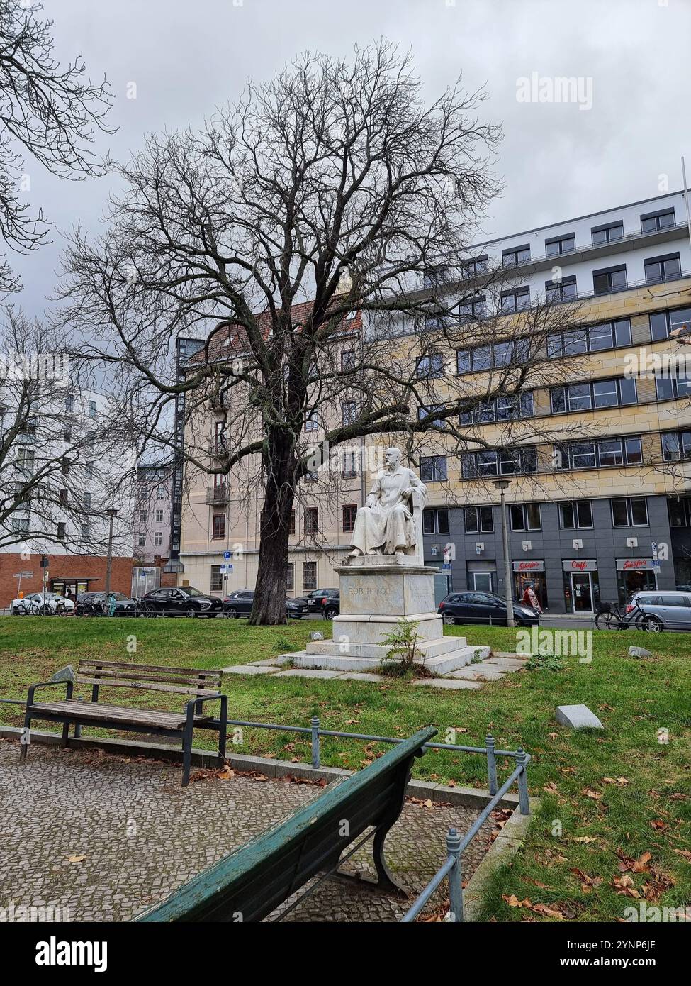 Statue, sculpture of Robert Koch with tree in a park near the Charité ...