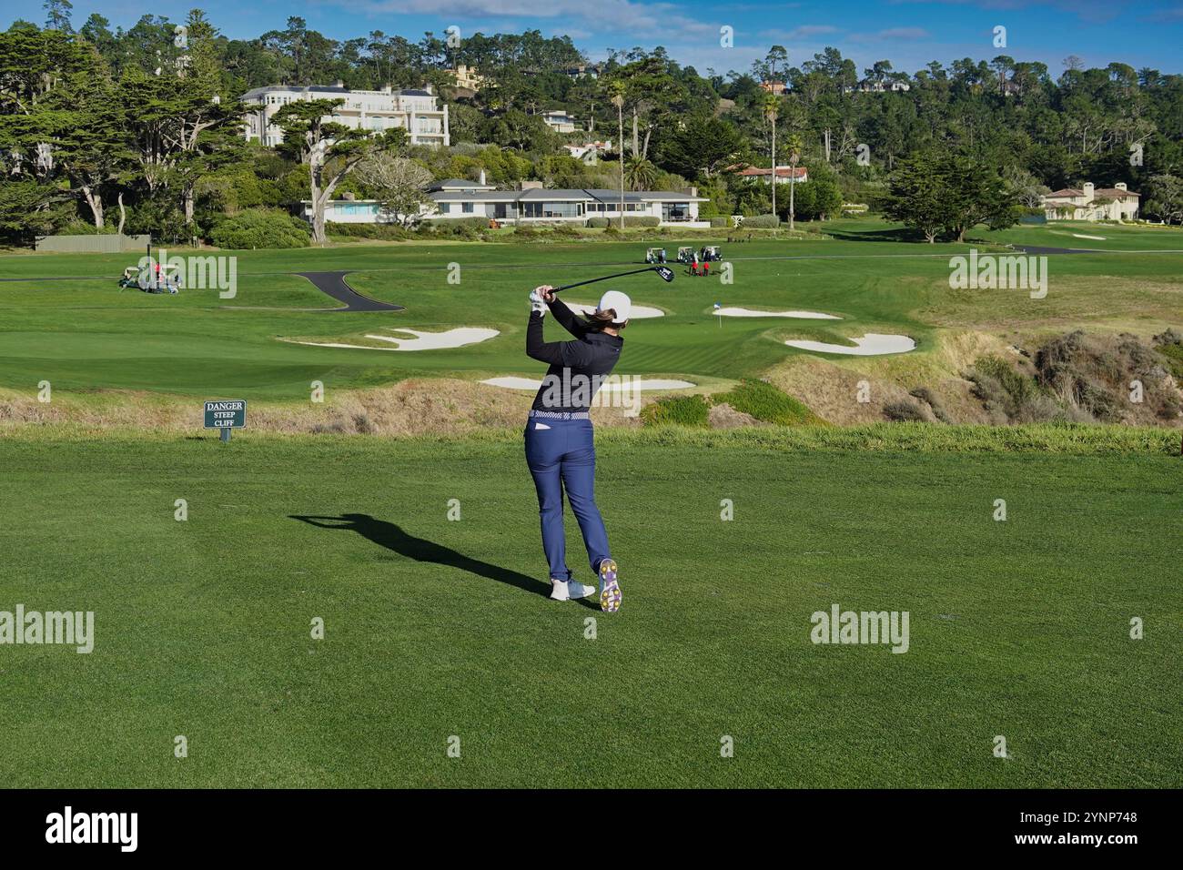 Pebble Beach, Monterey Peninsula, California USA - 2024 Female golfer plays second shot to the ...