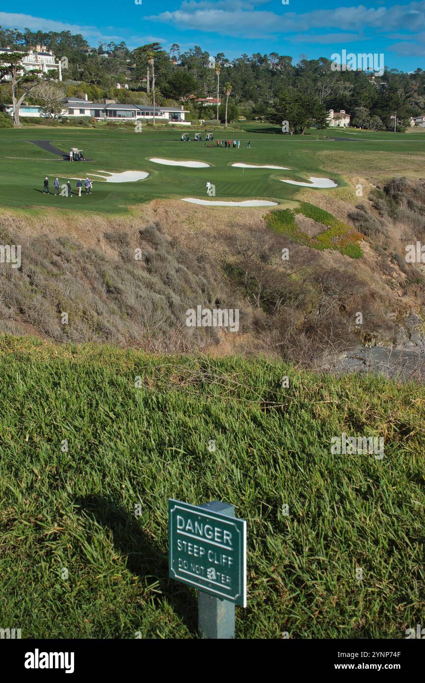 Pebble Beach, Monterey Peninsula, California USA - 2024 Golfers walk to the 8th hole on Pebble ...