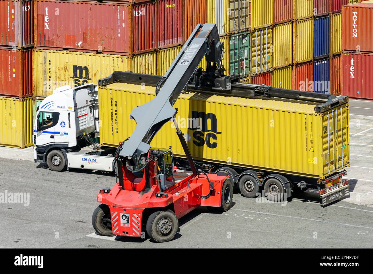 La Spezia, Italy - May 28, 2024: The forklift loads the cargo container ...